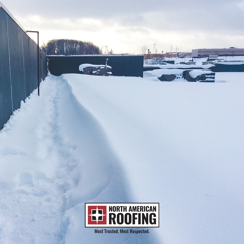 How Much Snow Can a Commercial Roof Hold? | Roof Snow Removal Experts